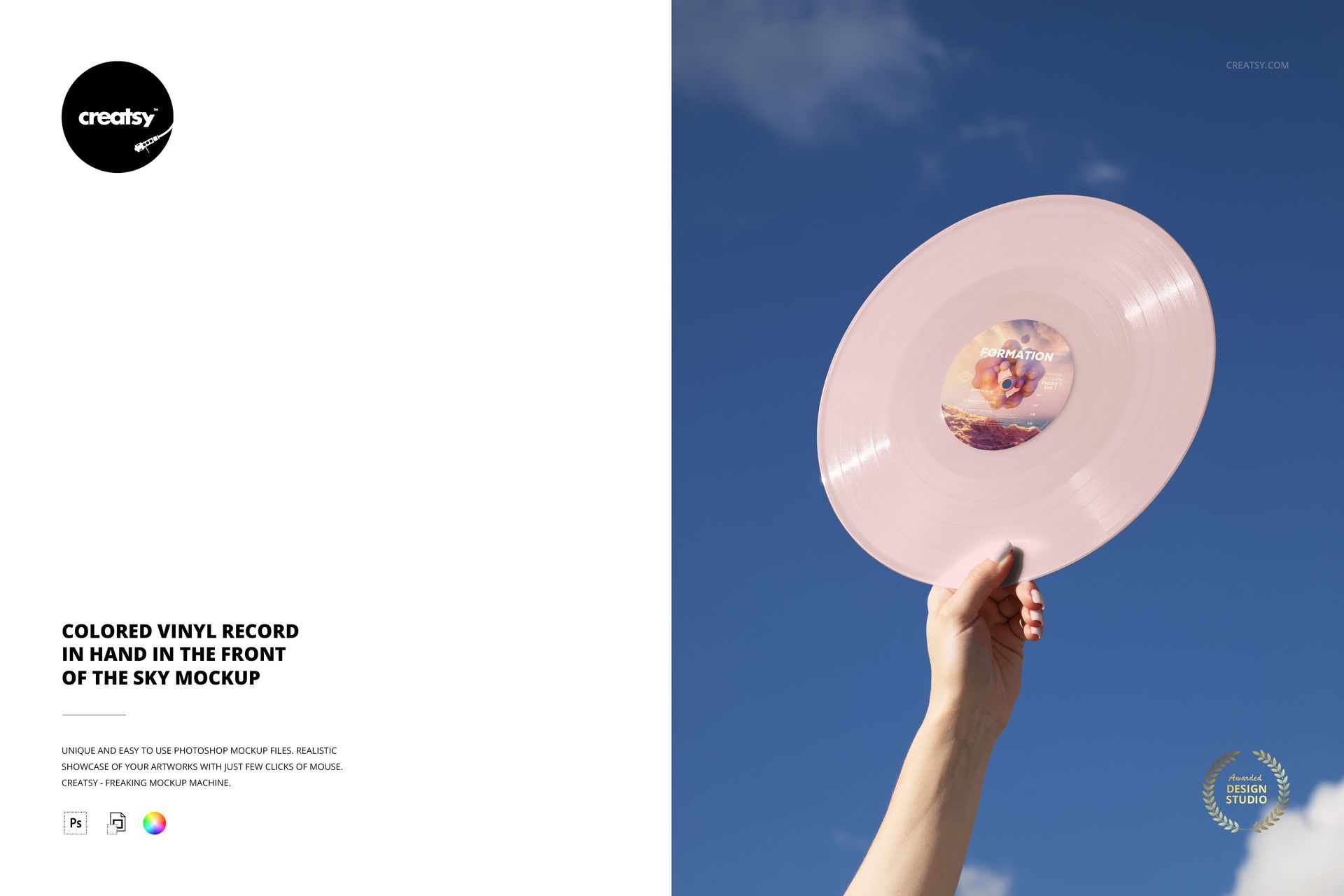 Colored Vinyl Record in Hand in the Front of the Sky Mockup | Creatsy®